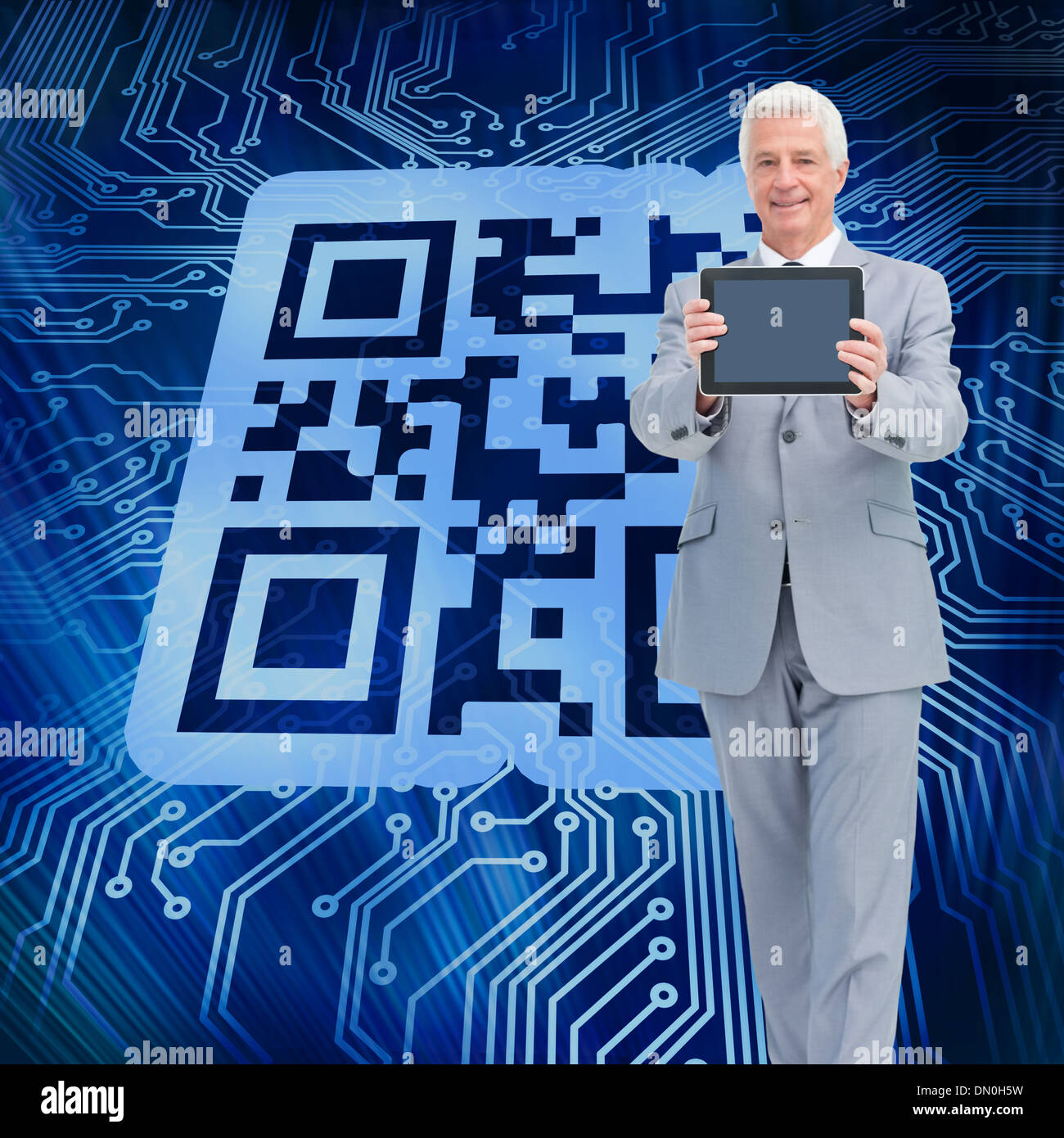 Composite image of boss showing a touch pad screen Stock Photo - Alamy