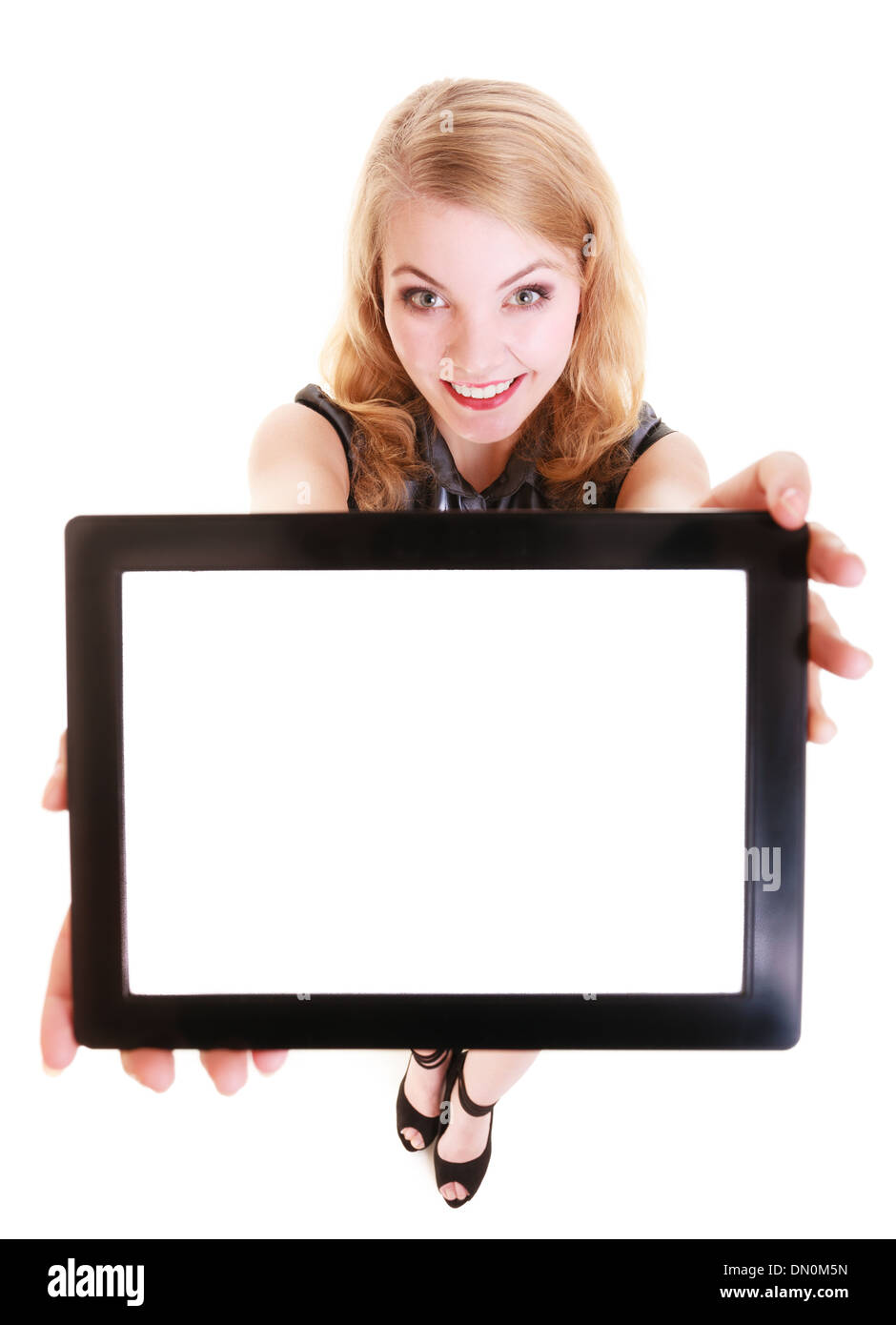 Happy smiling blond girl showing ipad tablet touchpad blank space Stock ...