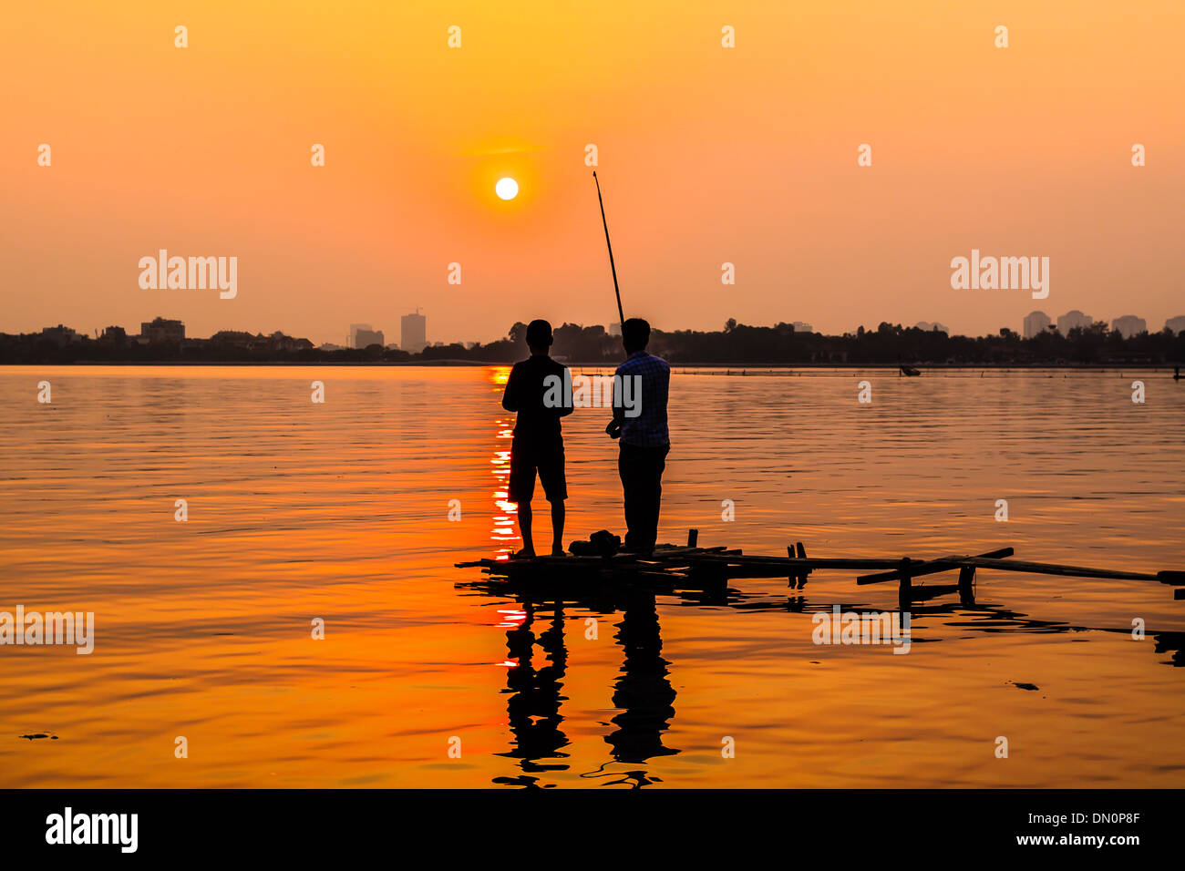 Sunset on west lake, Ho tay, Hanoi,V ietnam Stock Photo - Alamy