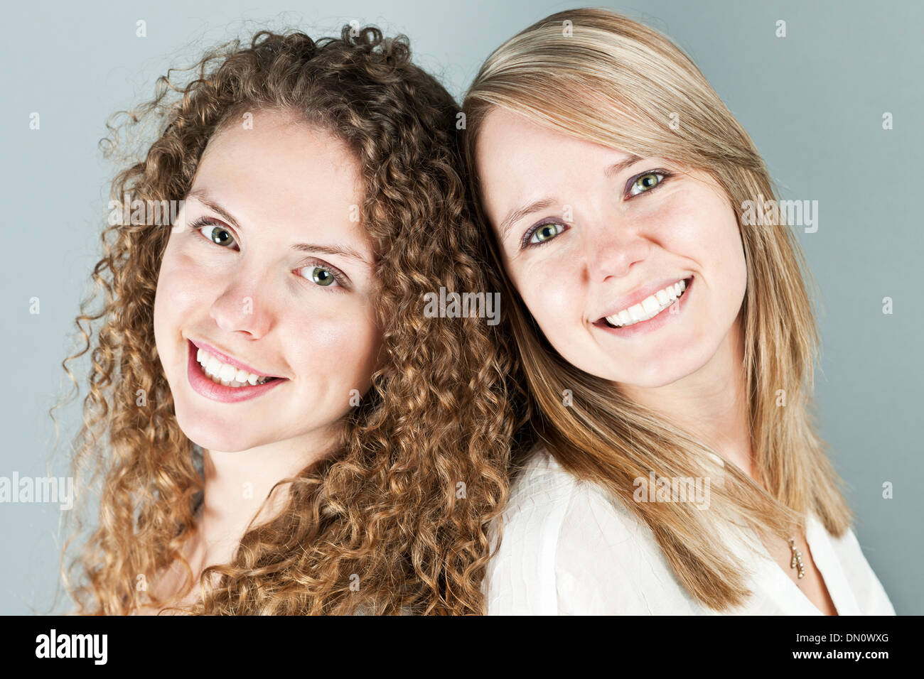Portrait two blond sisters hi-res stock photography and images - Alamy