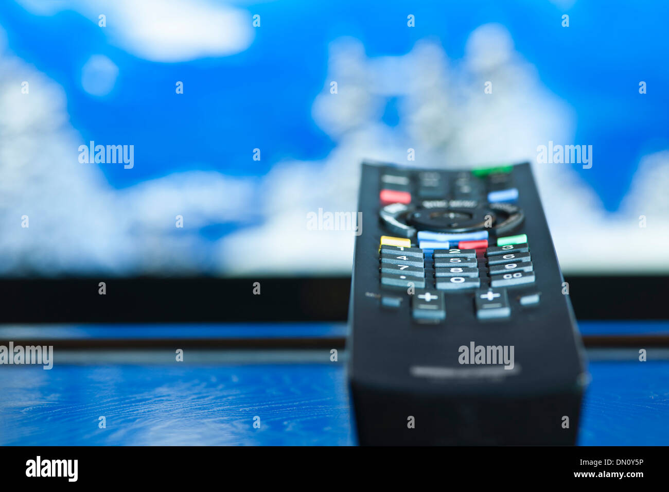 Television remote control closeup pointing at tv Stock Photo - Alamy
