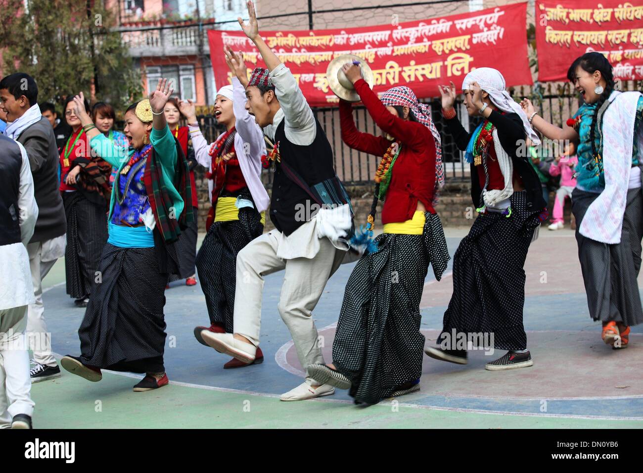 Kathmandu, Nepal. 17th Dec, 2013. People dance during the celebration ...