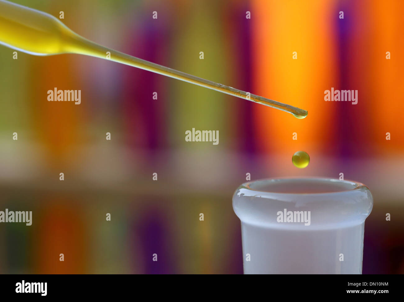 Blue drop falling test tube hi-res stock photography and images - Alamy