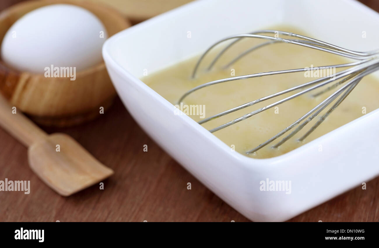 Egg beater in a kitchen for preparing meal Stock Photo - Alamy