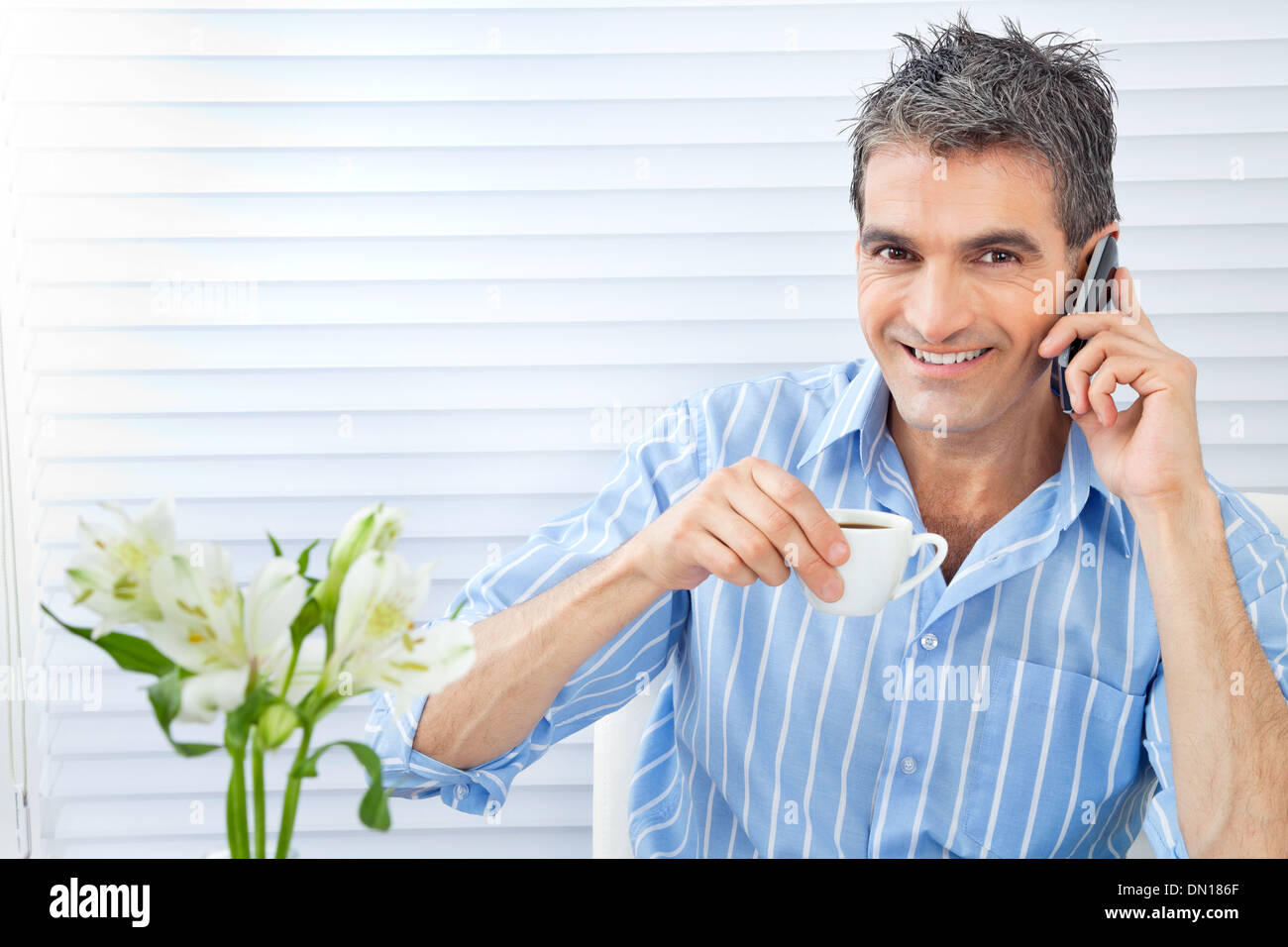 Happy Man Receiving Phone Call Stock Photo - Alamy