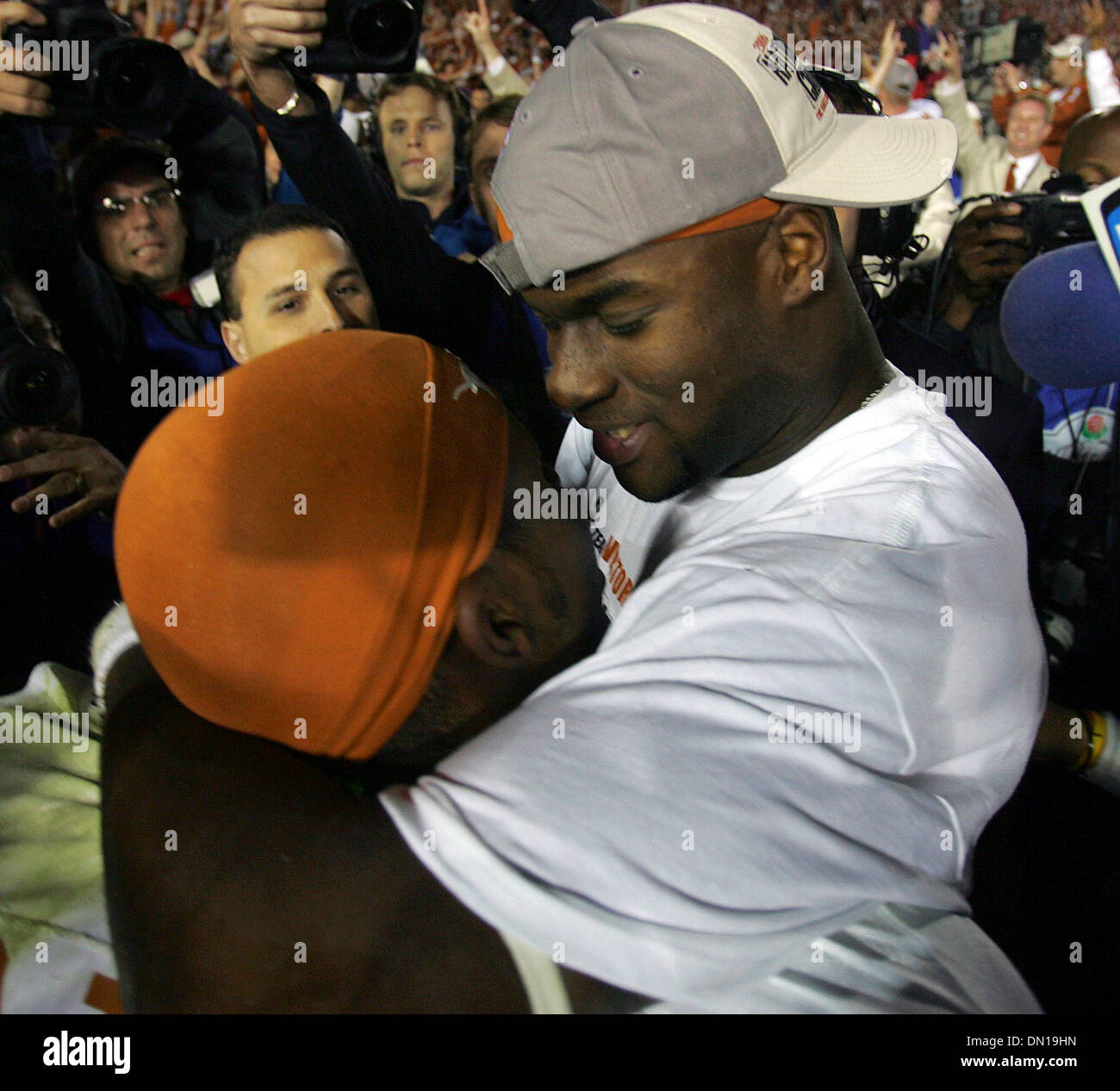 Jan 04, 2006; Pasadena, CA, USA; Vince Young celebrates with Ramonce ...
