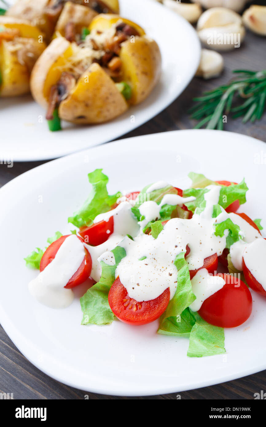 Tomato and lattuce salad Stock Photo - Alamy