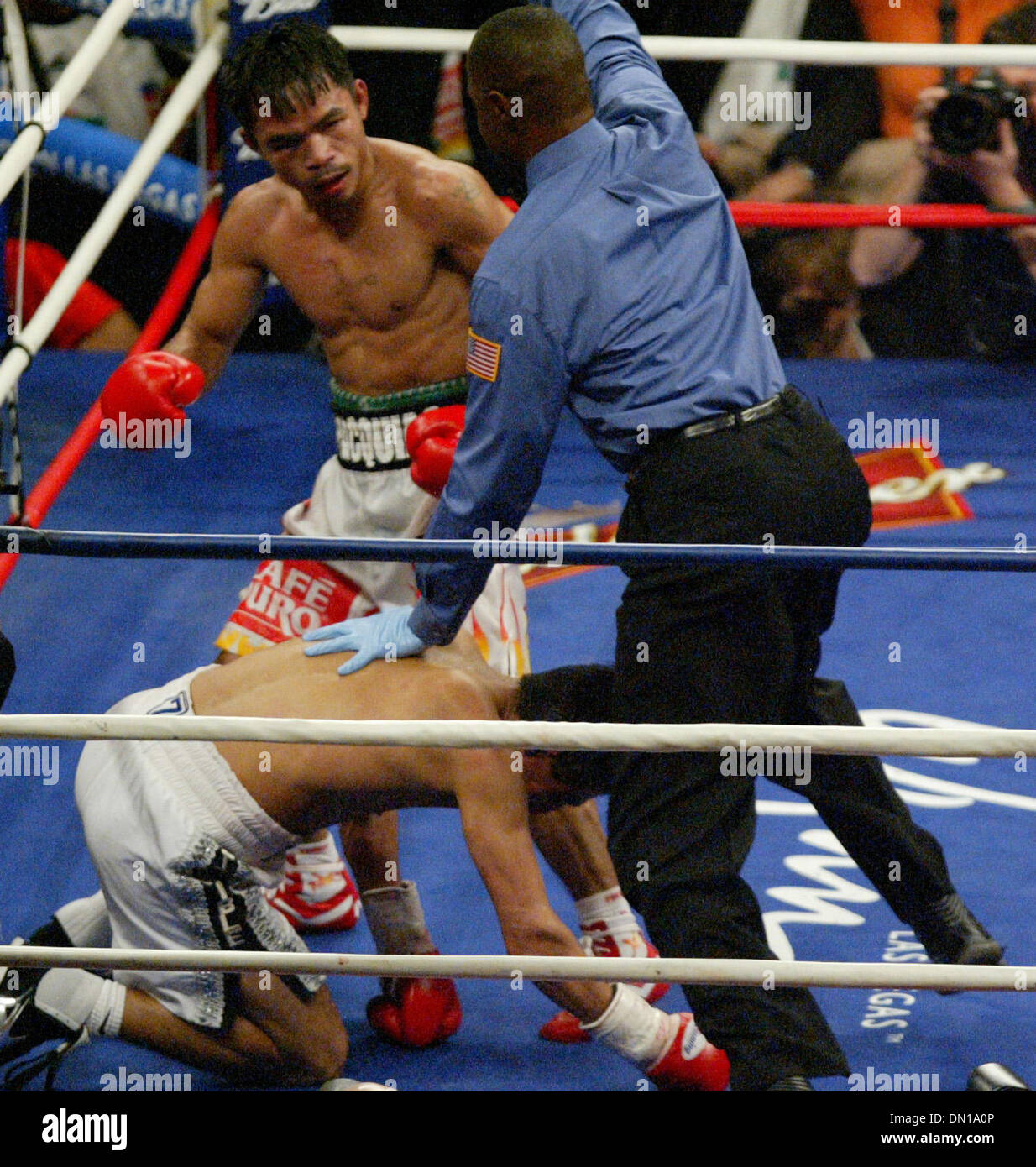 Jan 21, 2006; Las Vegas, NV, USA; Referee KENNY BAYLESS, right, stops ...