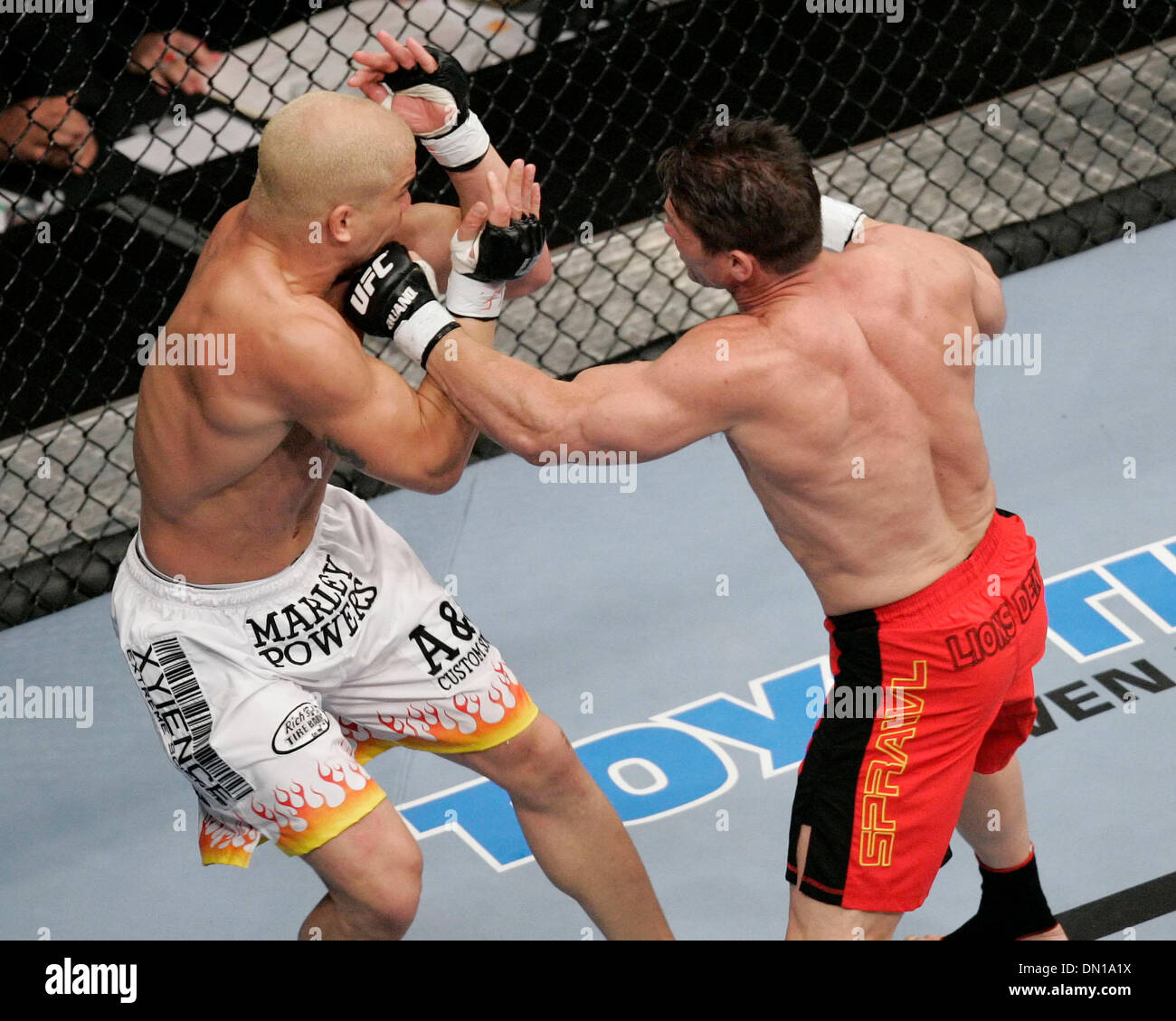 July 8, 2006: Ken Shamrock connects with a left hook in the first round ...