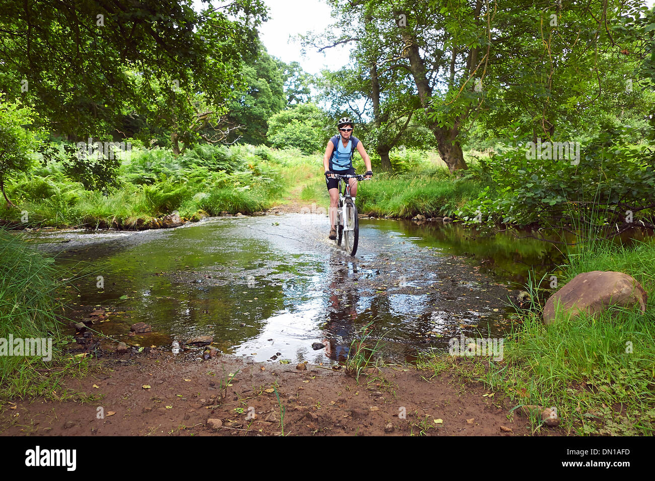 Female crossing a river hi-res stock photography and images - Alamy