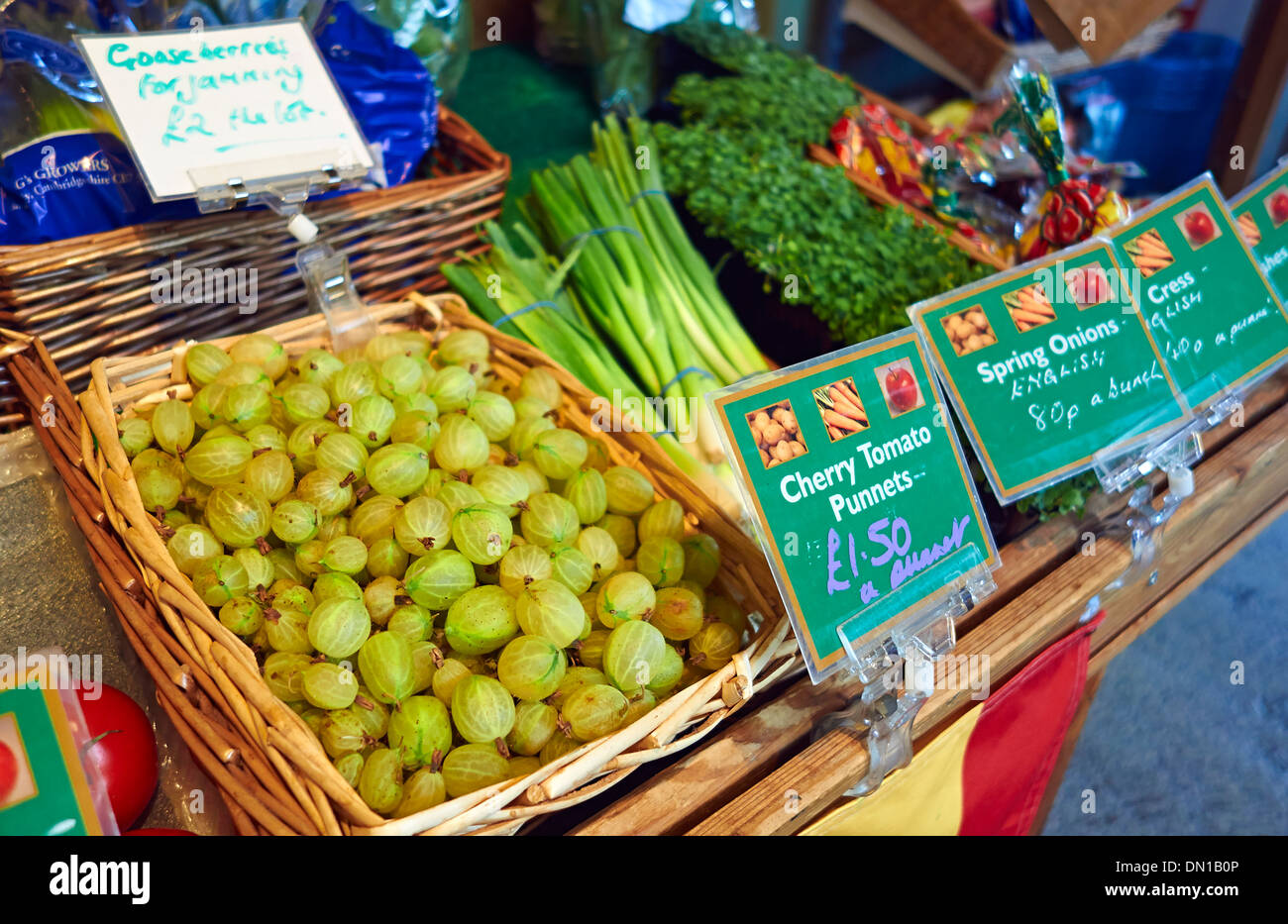 A display of fresh fruit and vegetables at a farm shop in ...