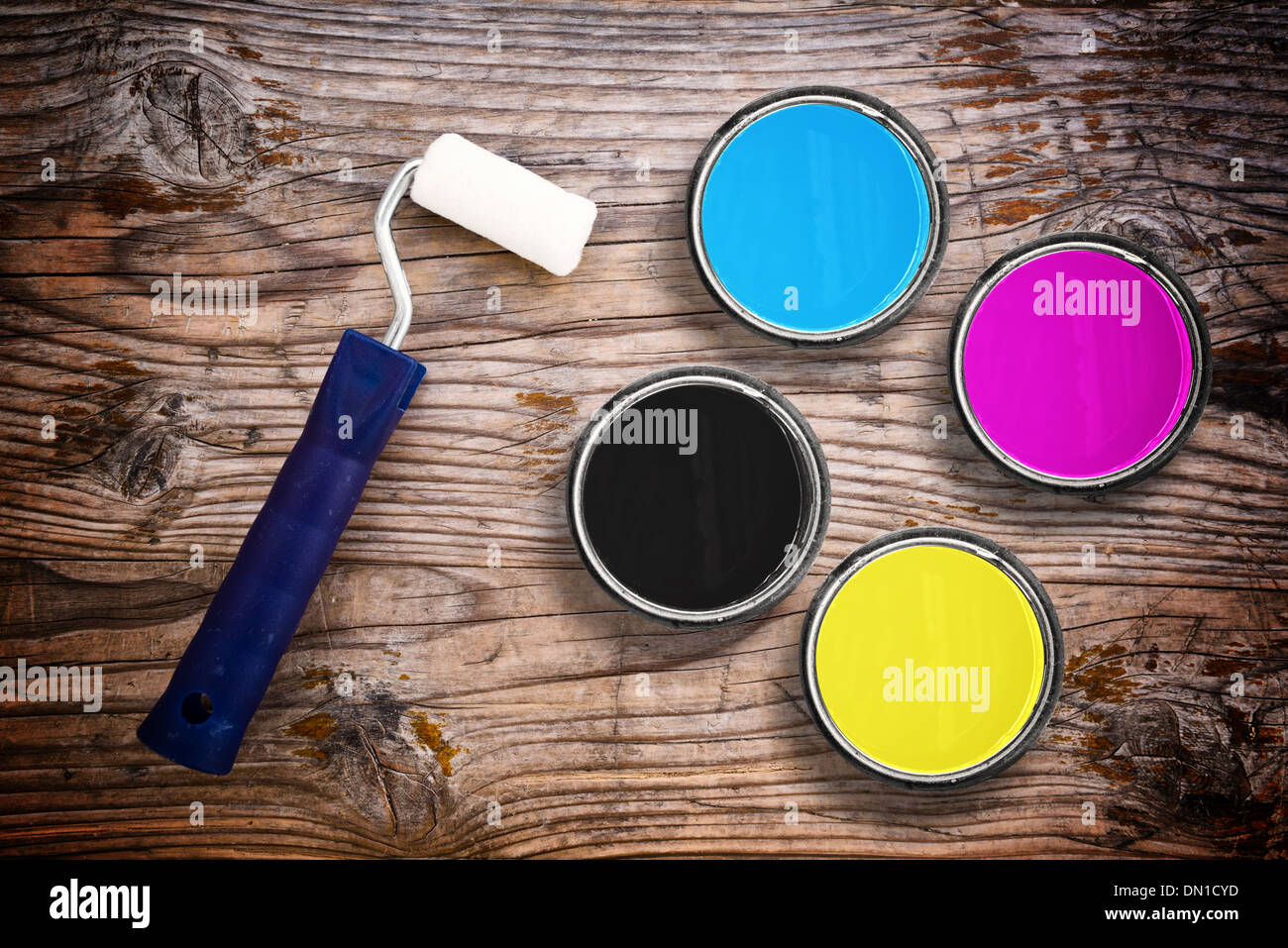 Metal tin cans with four process CMYK colors with paint roller ...