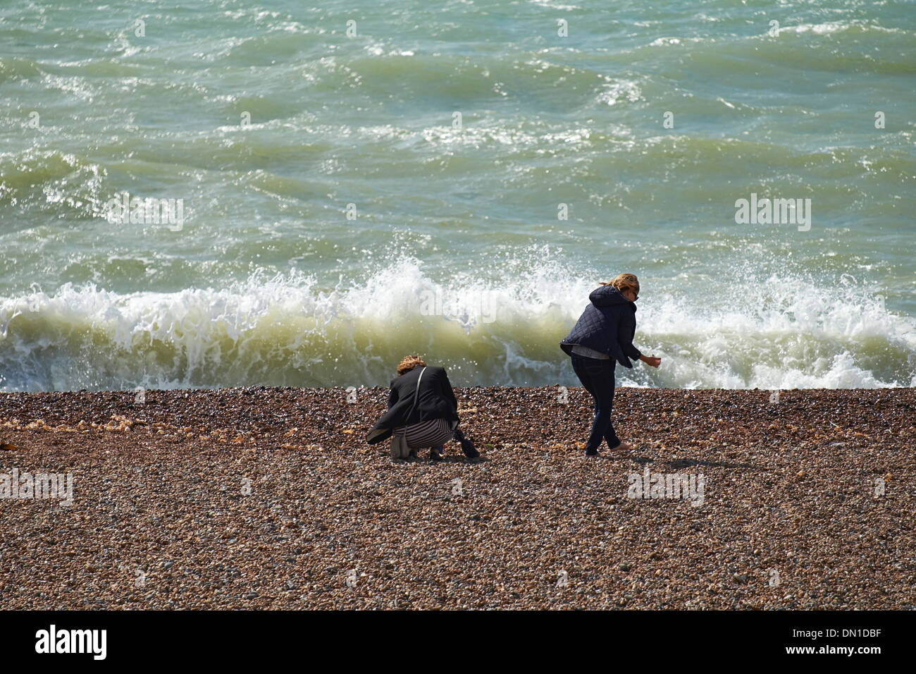Throwing stone into sea hi-res stock photography and images - Alamy