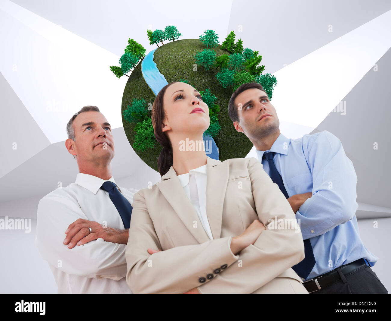 Composite image of serious work team posing together looking away Stock ...