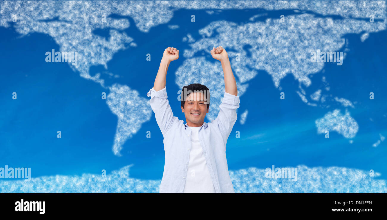 Composite image of cheering male with arms up Stock Photo - Alamy