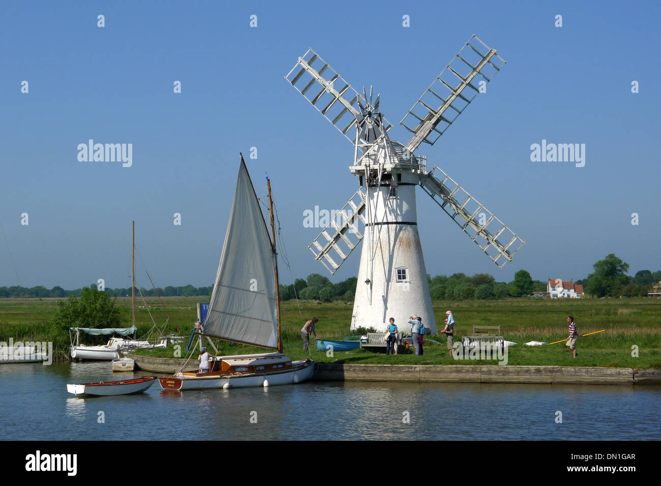 Sailing boats on the Norfolk Broads at Thurne windmill, UK Stock Photo ...