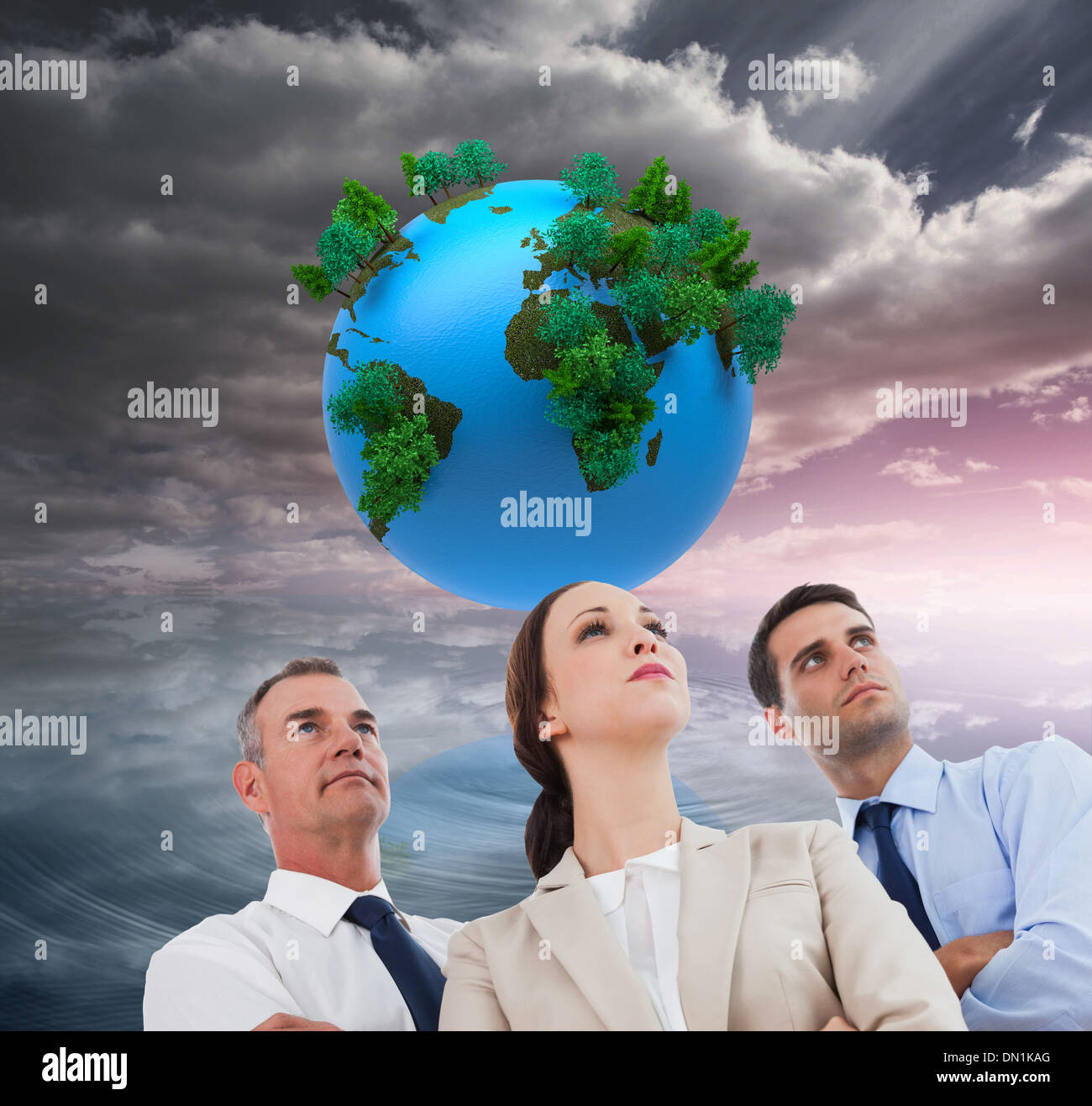 Composite image of serious work team posing together looking away Stock ...