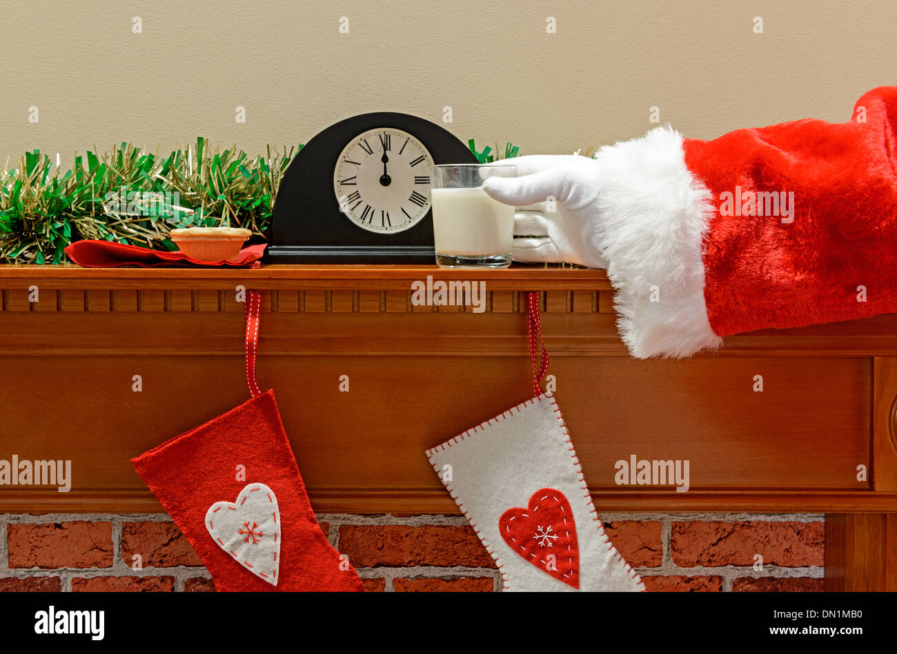 Santa reaching glass milk midnight hi-res stock photography and images ...