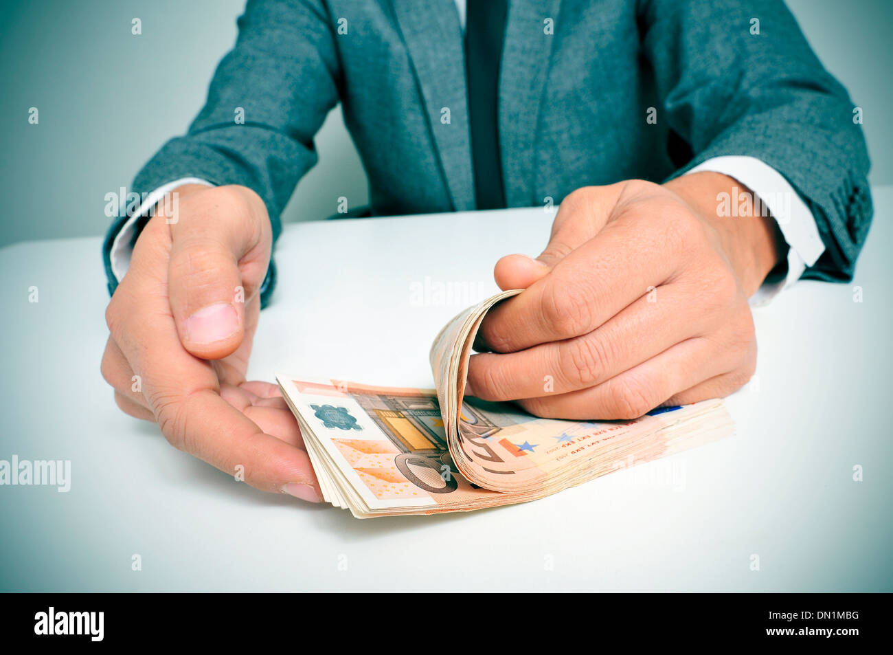 Man counting money euro hi-res stock photography and images - Alamy