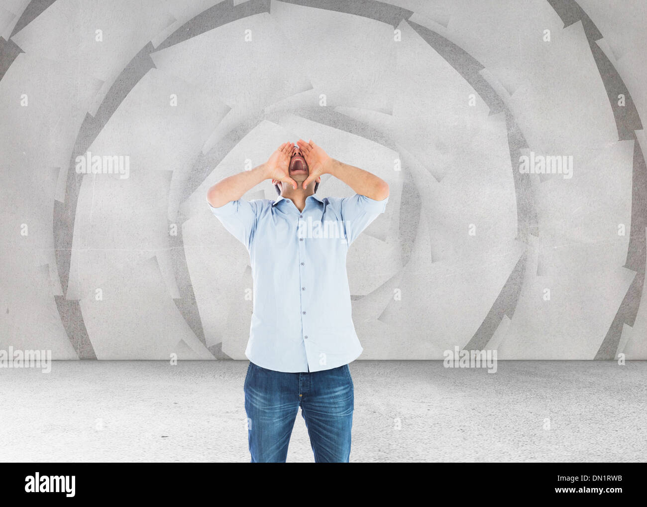 Composite image of shouting casual man standing Stock Photo - Alamy