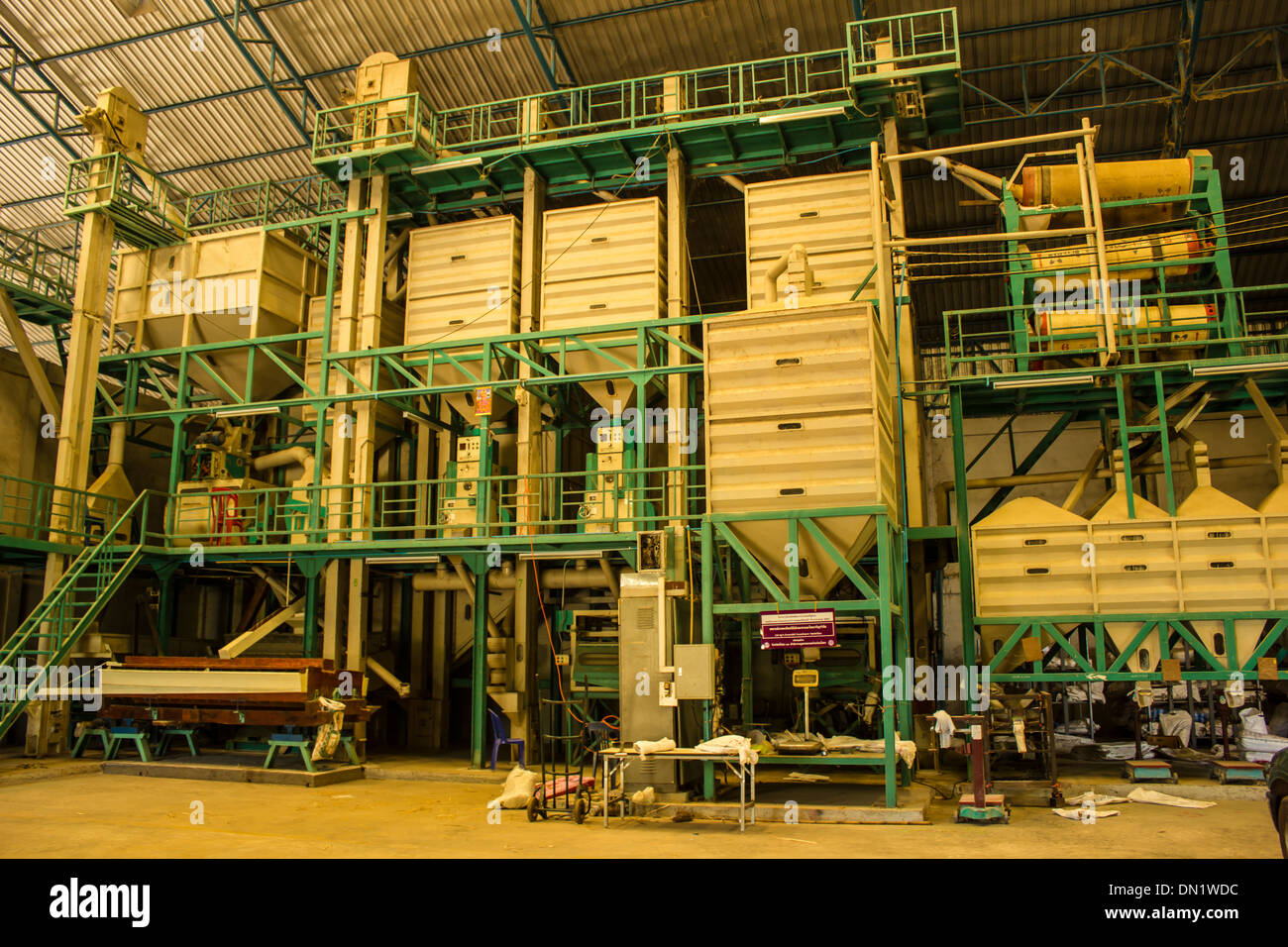 Large selection of modern rice mills in Thailand Stock Photo - Alamy
