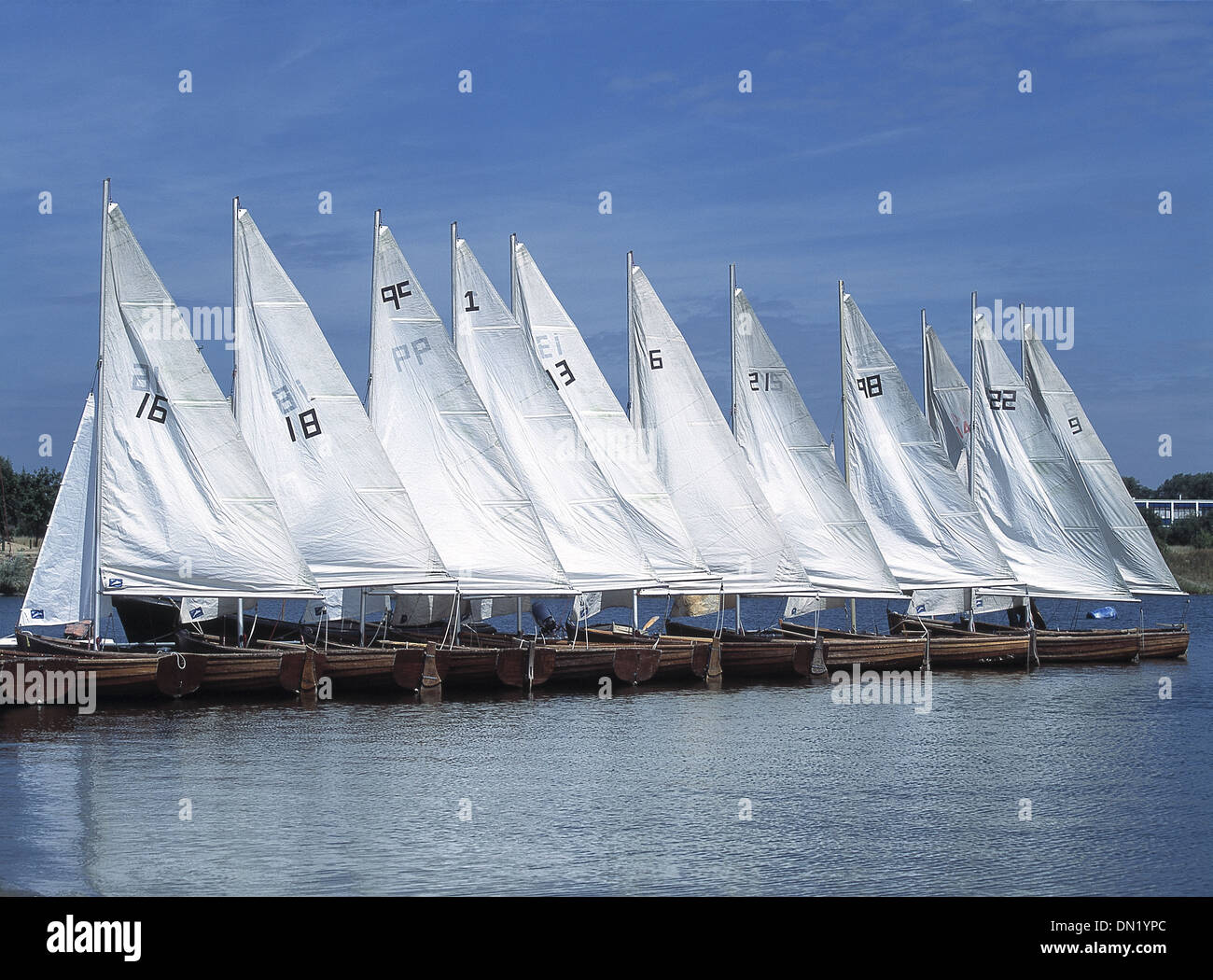 Line of sailing boats Stock Photo - Alamy