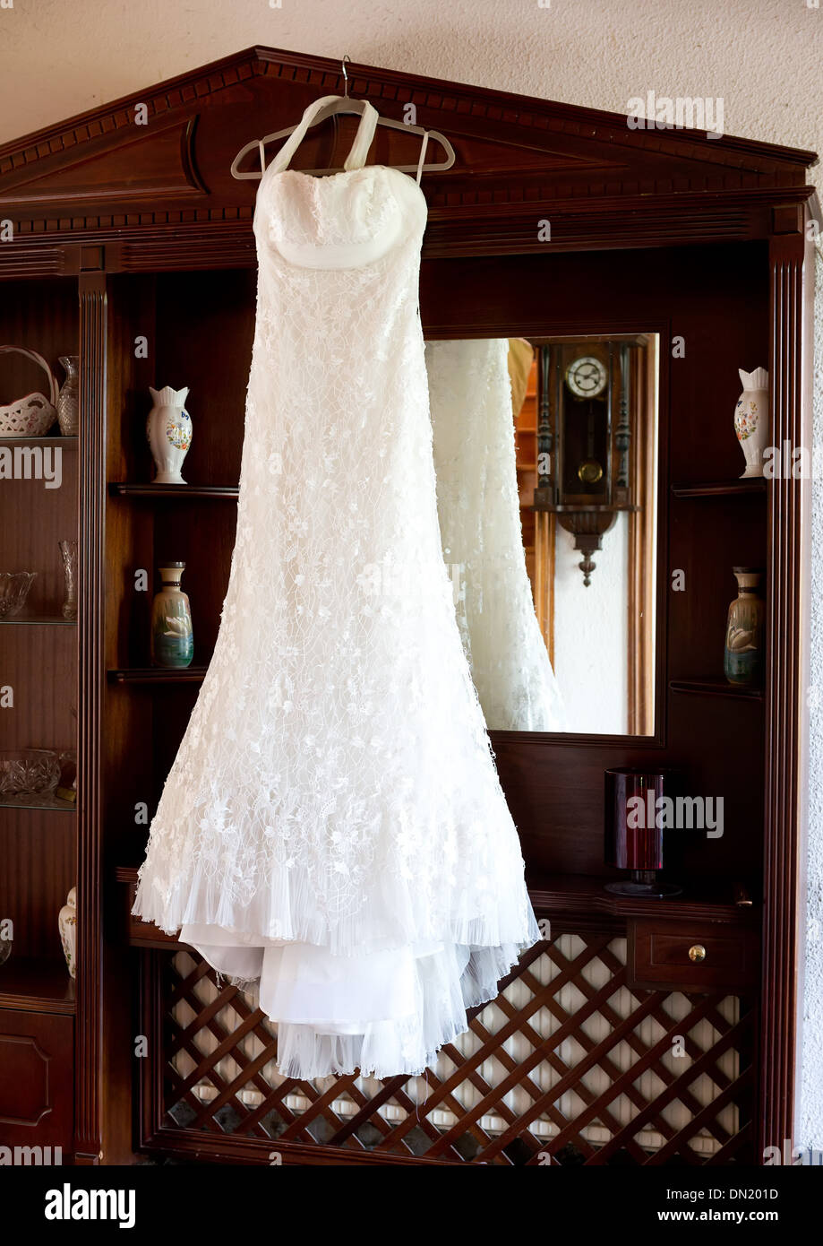 brides dress on a hanger in brides house waiting for the big day Stock ...