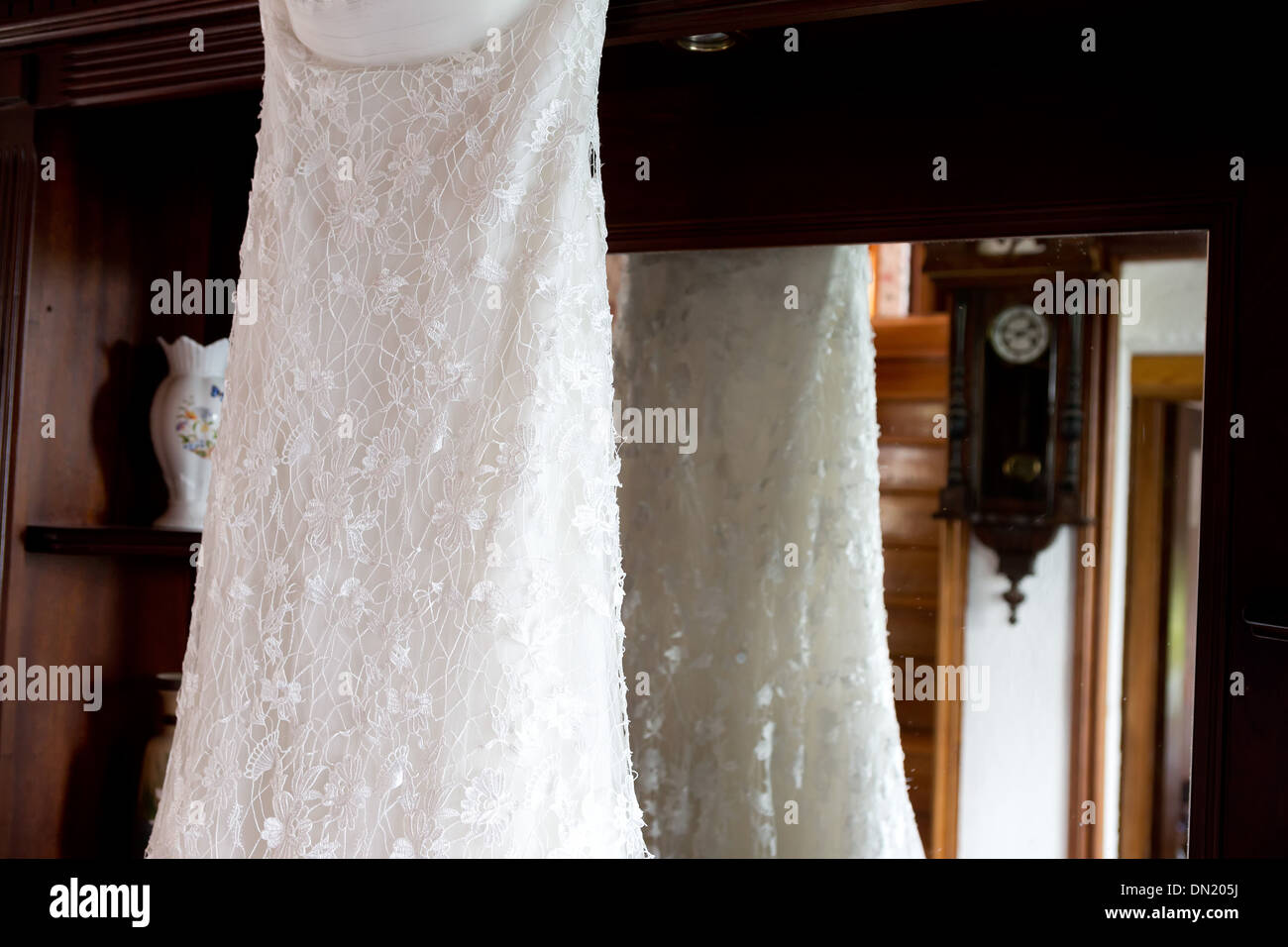 brides dress on a hanger in brides house waiting for the big day Stock ...