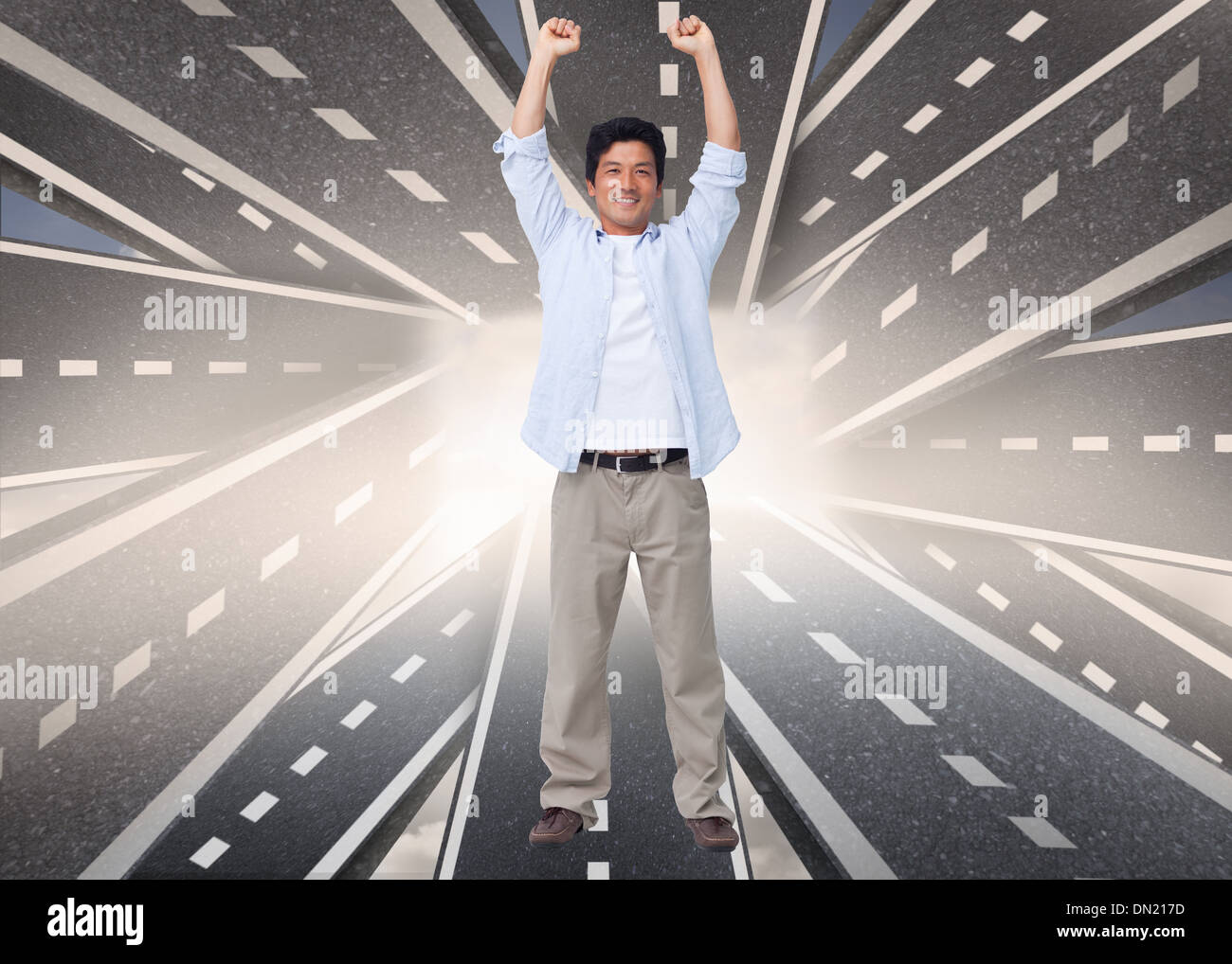 Composite image of cheering male with arms up Stock Photo - Alamy