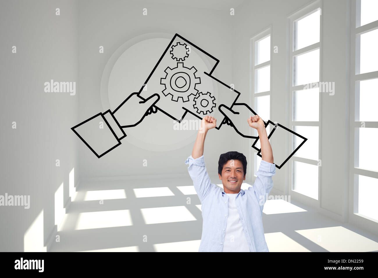 Composite image of cheering male with arms up Stock Photo - Alamy