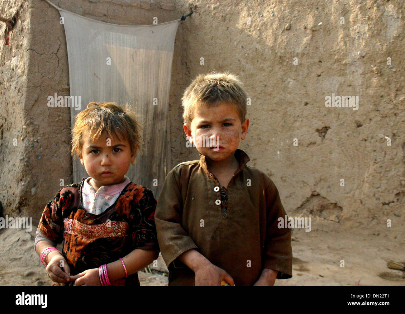 Peshawar. 18th Dec, 2013. Afghan refugee children pose for a photos in ...
