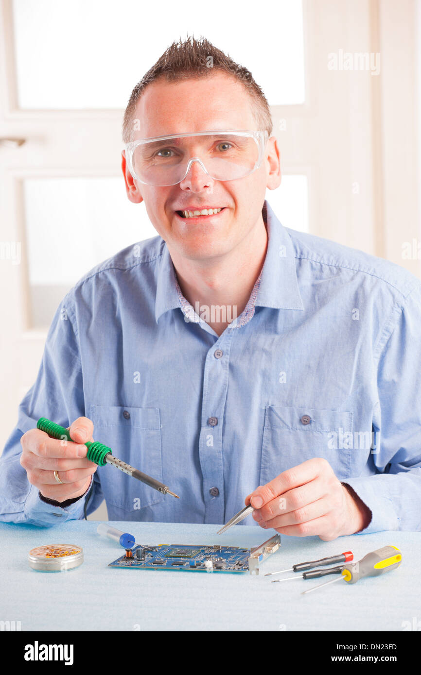 Man Soldering High Resolution Stock Photography and Images - Alamy
