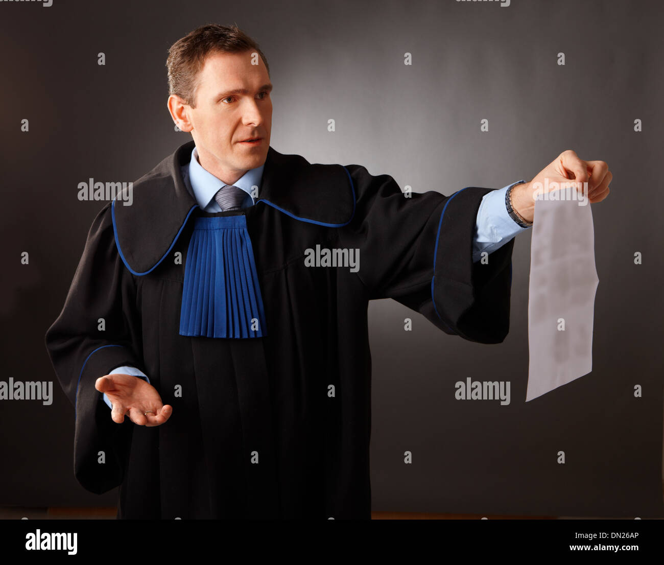 Attorney wearing classic gown talking in court Stock Photo - Alamy