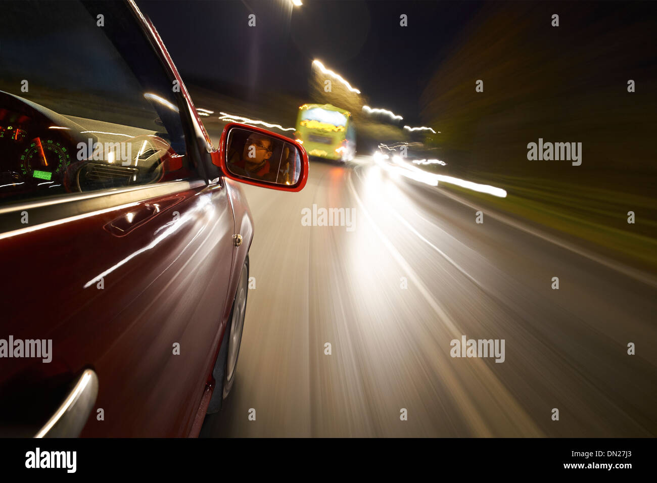 Red bus side view hi-res stock photography and images - Alamy