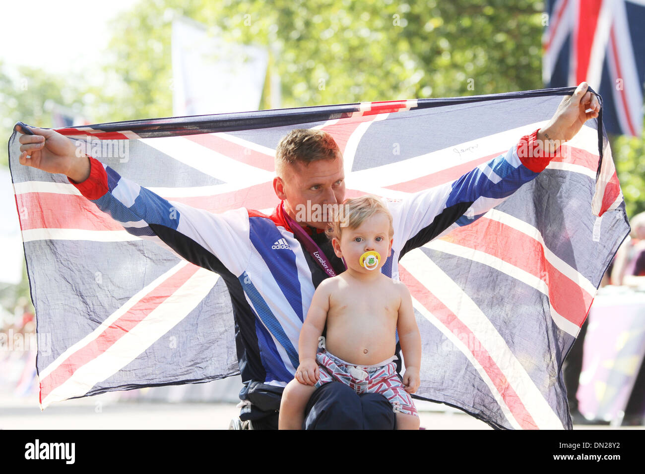 David Weir & his son Mason after winning the gold medal in mens ...