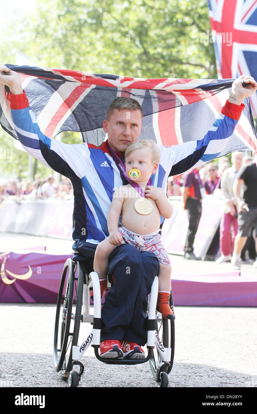 David Weir & his son Mason after winning the gold medal in mens ...