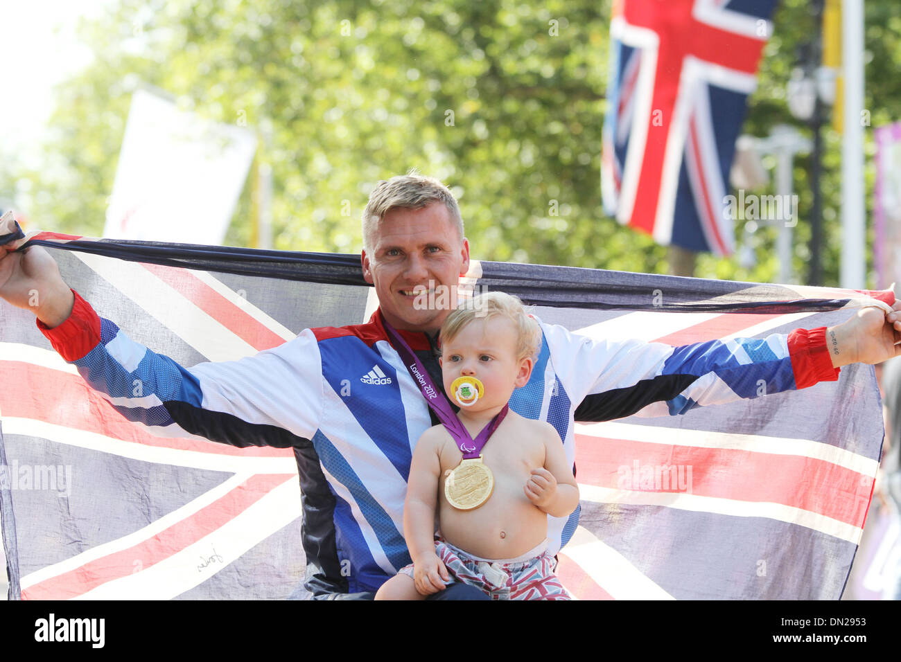 David Weir & his son Mason after winning the gold medal in mens ...