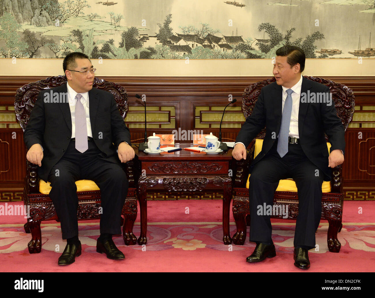 Beijing, China. 18th Dec, 2013. Chinese President Xi Jinping (R) meets ...