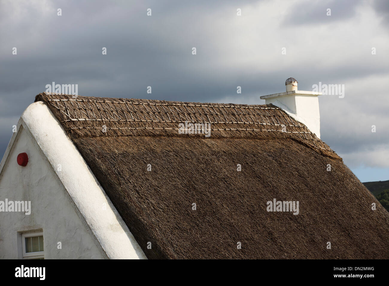 Traditional Old Irish Cottage with a thatched roof in Connemara, Co ...