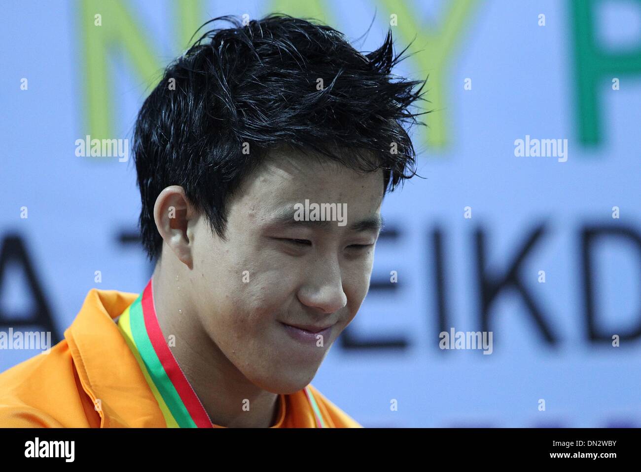 Nay Pyi Taw, Myanmar. 18th Dec, 2013. Ng Yan Yee of Malaysia receives ...