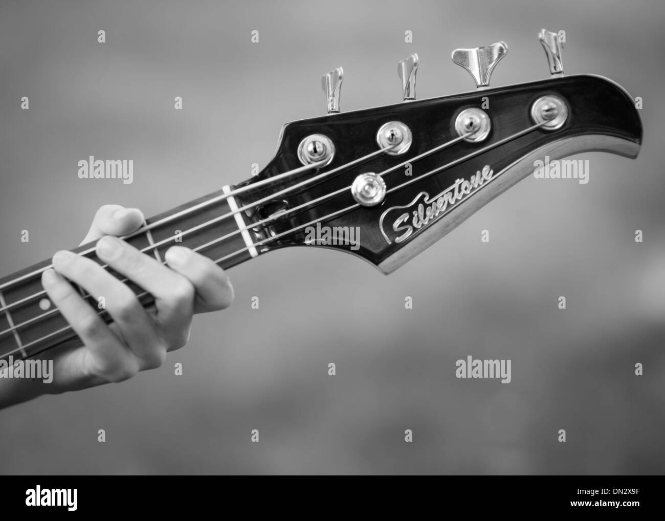 Hands with musical instrument Stock Photo - Alamy