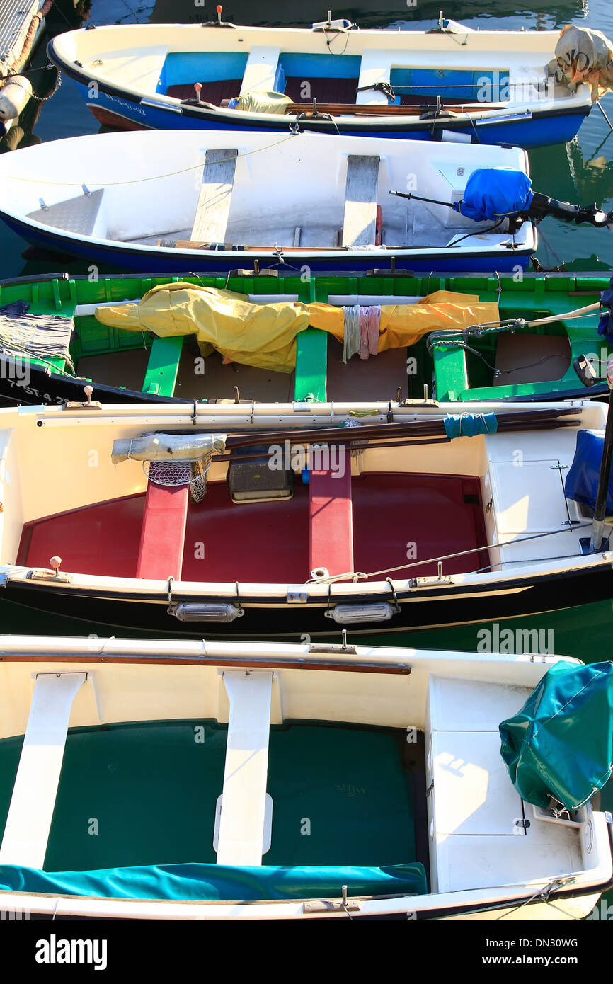 many rowing boats and fishing engine nice colors Stock Photo - Alamy
