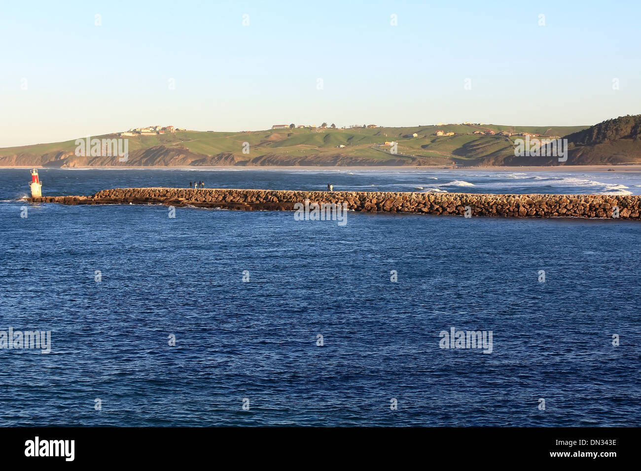 breakwater with lighthouse Stock Photo - Alamy