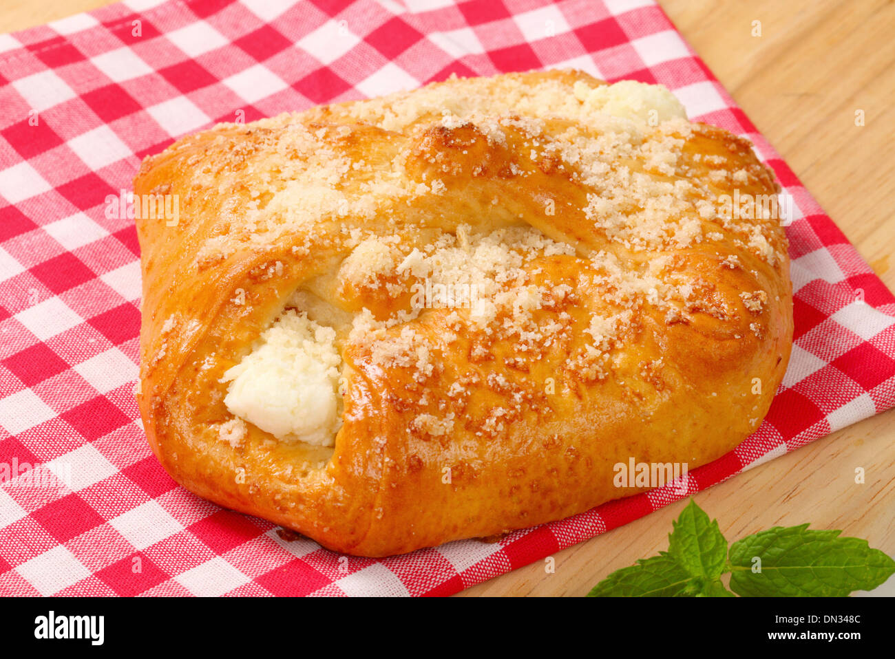 Sweet pastry with cream cheese filling Stock Photo - Alamy