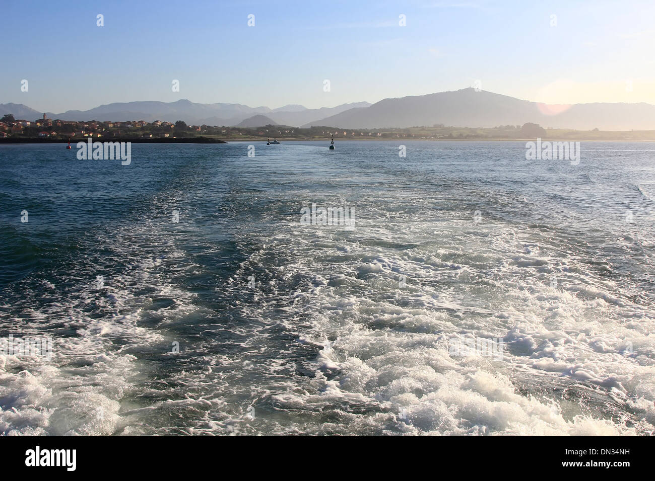 waves formed by the engine of a ship at sea Stock Photo - Alamy