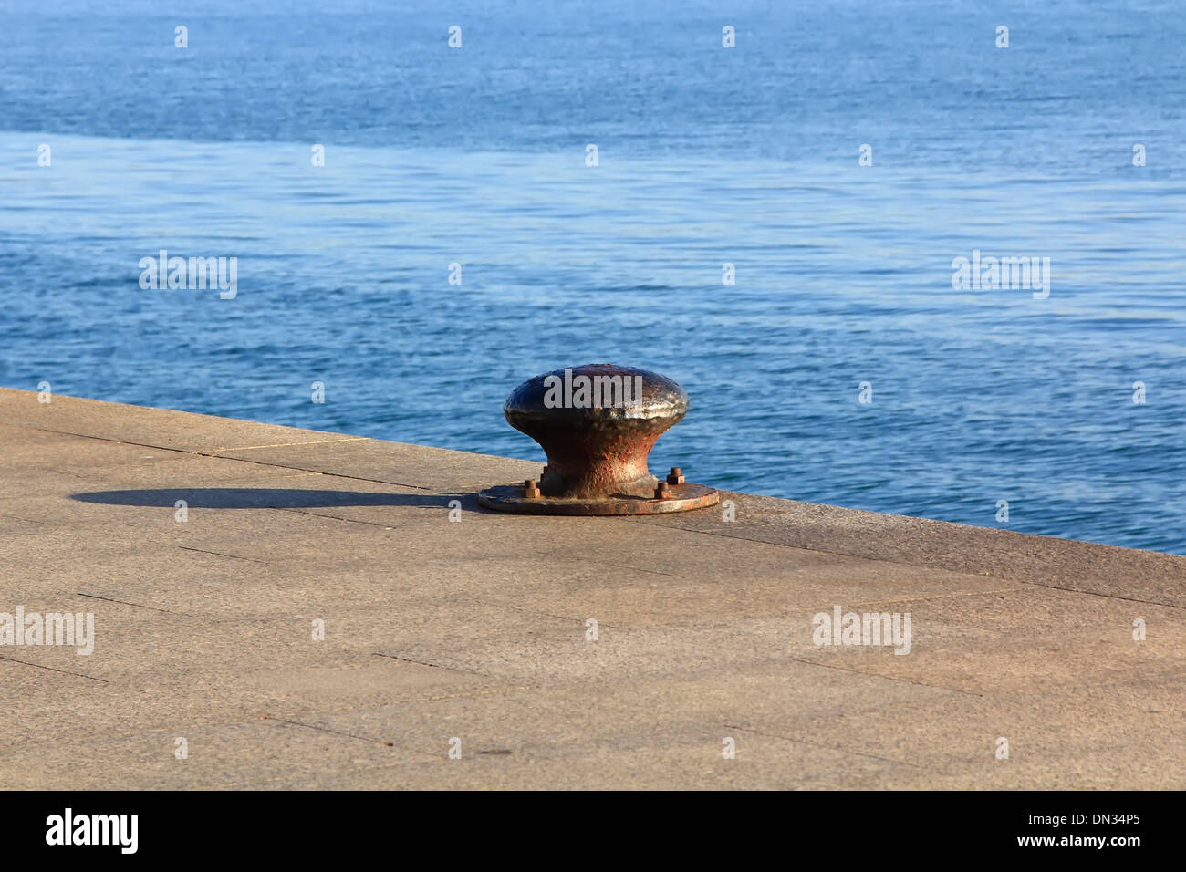 metal ship moorings Stock Photo - Alamy