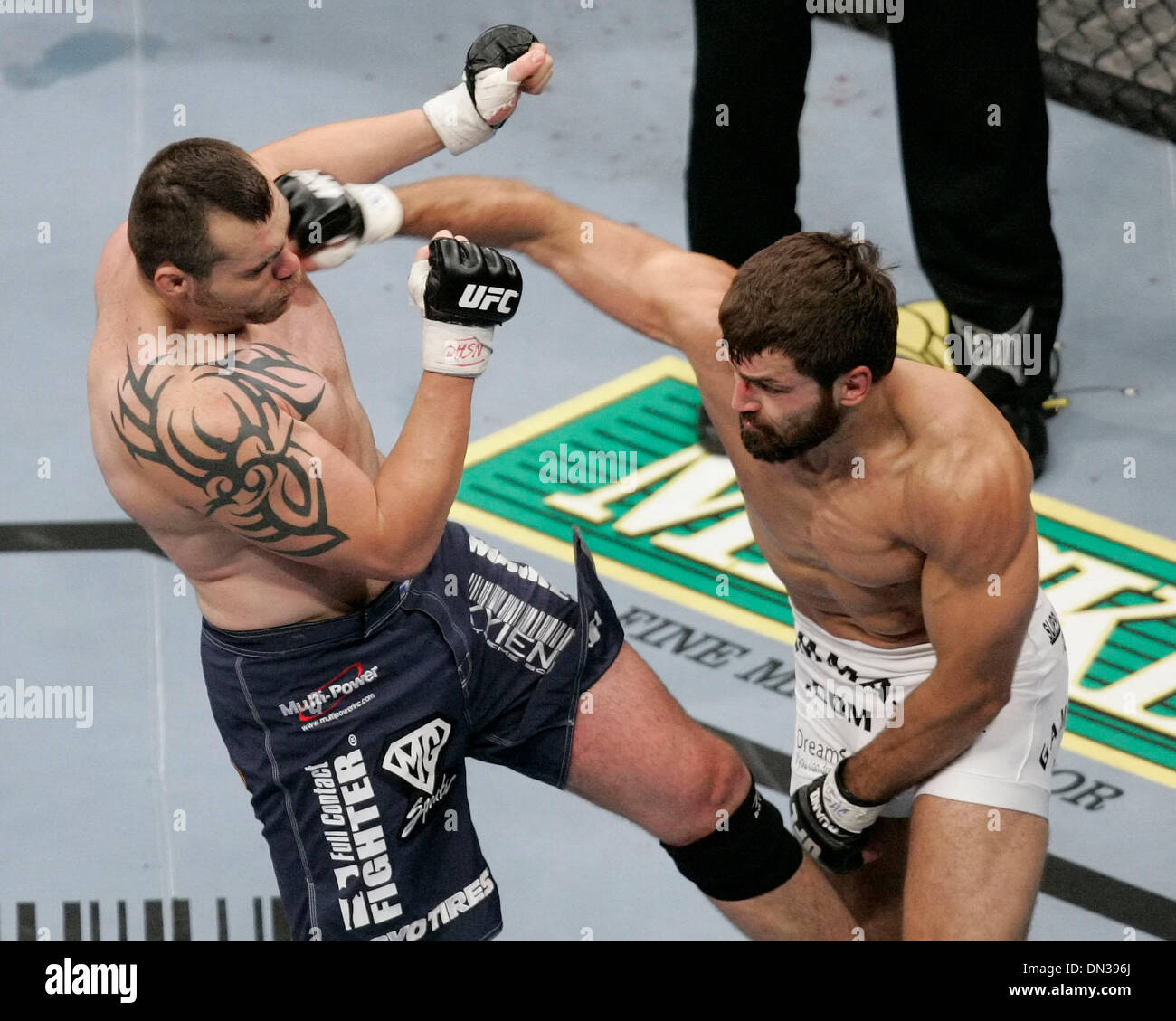 July 8, 2006: Andrei Arlovski connects with a punch against Tim Sylvia ...