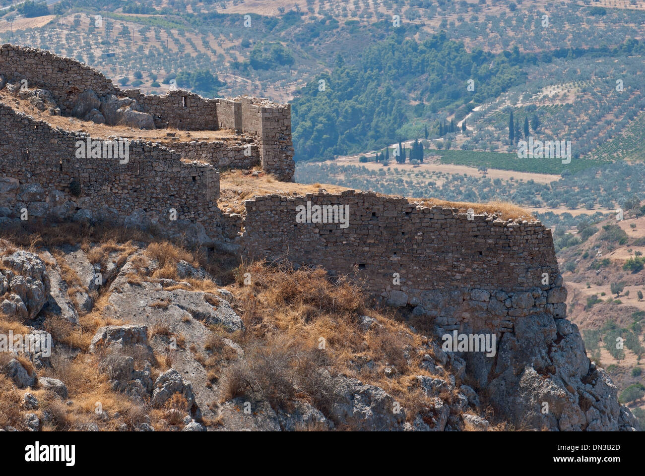 The ruins of an old fortress in ancient Corinth on a slope of a high ...