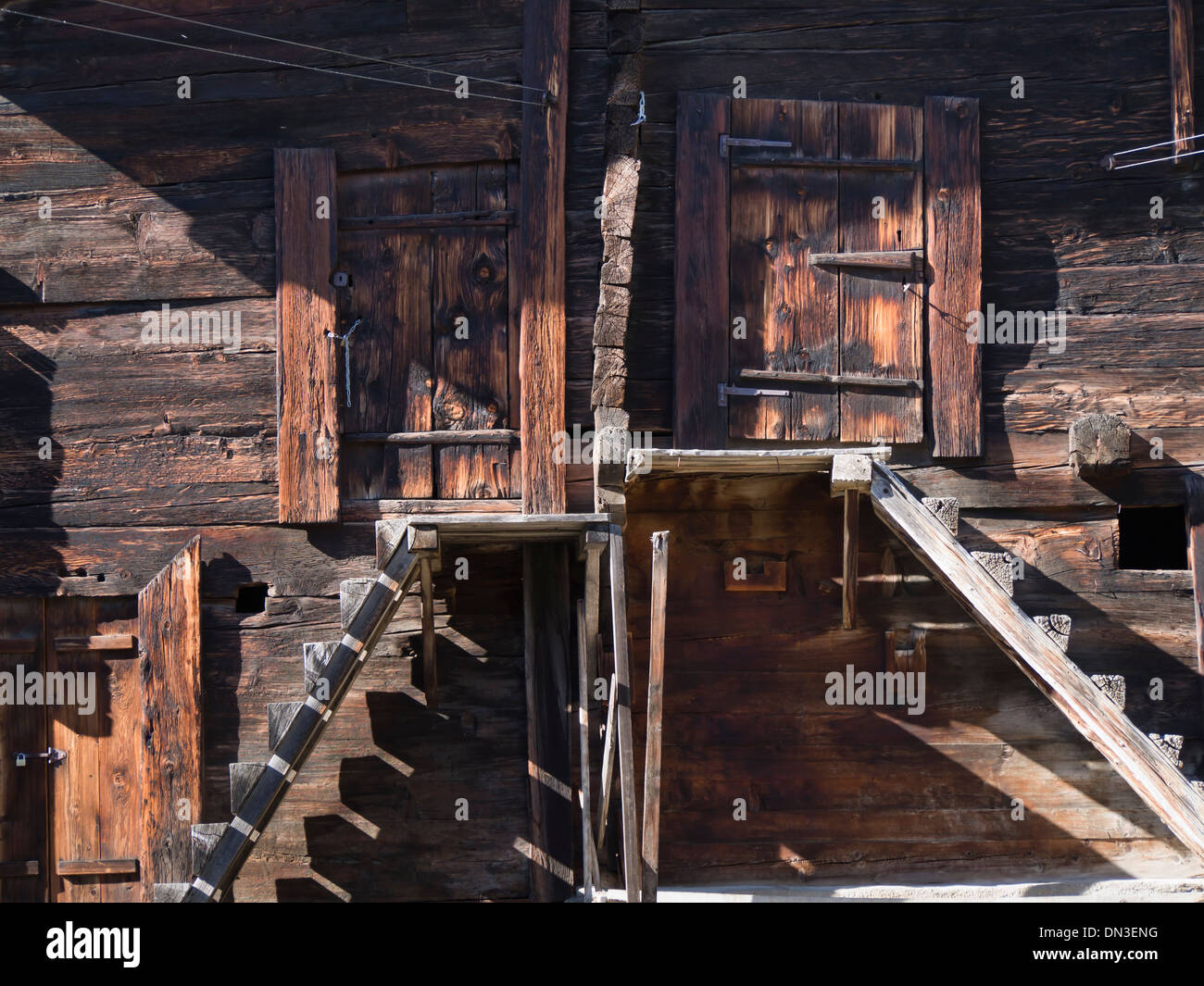 Old typical traditional timber house, stairs and doors, the village ...