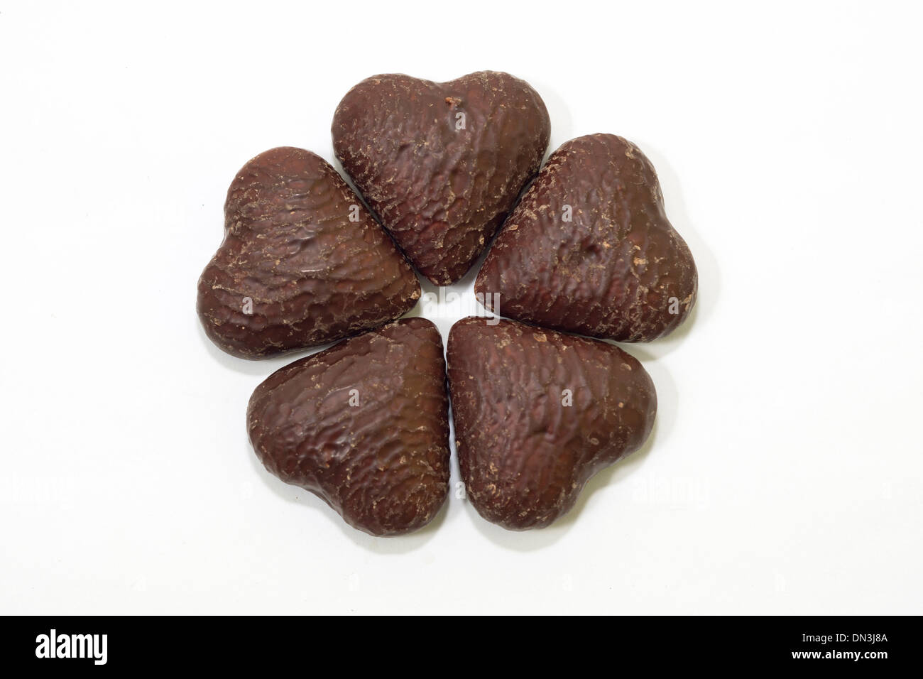 Five heart shaped gingerbread cookies Stock Photo - Alamy
